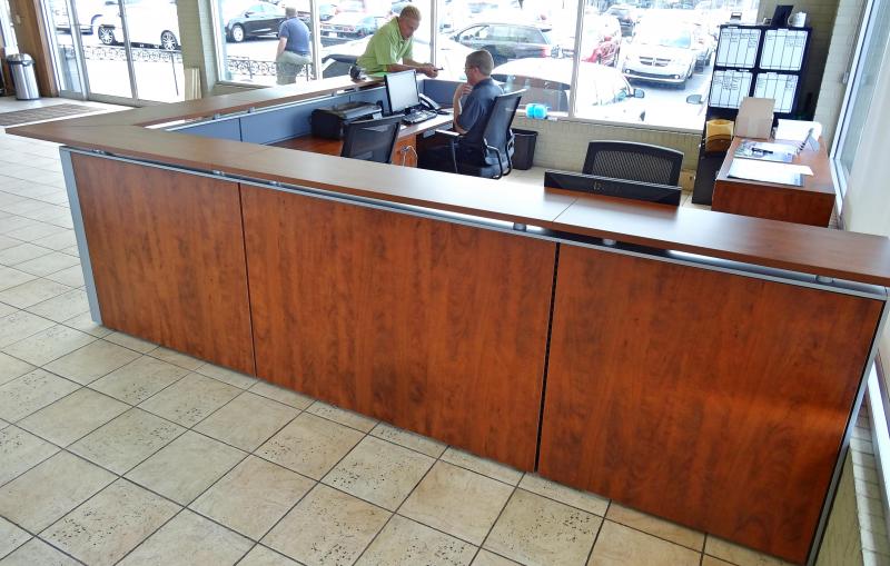 The Wells Group - Reception DesksLOGOS ARE PROIVDED BY DEALERSHIP
